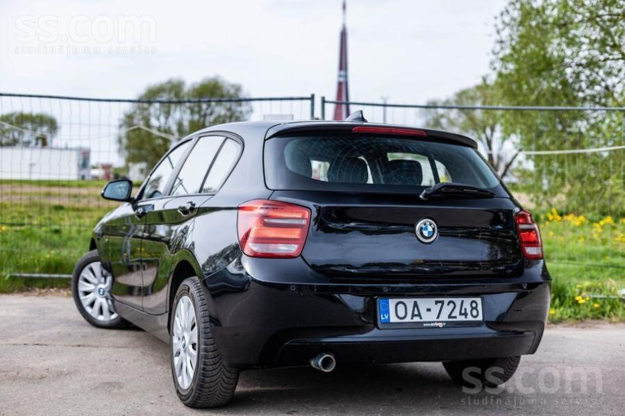 Black BMW 118 2011 in Riga, with an engine capacity of 2.00 L and mileage of 325 thousand km for 6290 €, photo 7 on AUTOMOTO.COM.LV