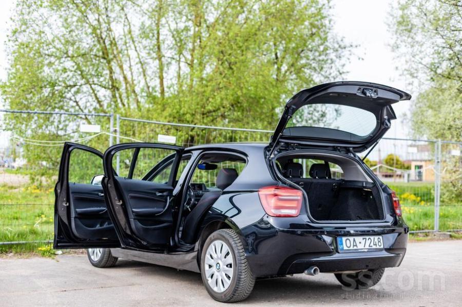 Black BMW 118 2011 in Riga, with an engine capacity of 2.00 L and mileage of 325 thousand km for 6290 €, photo 10 on AUTOMOTO.COM.LV