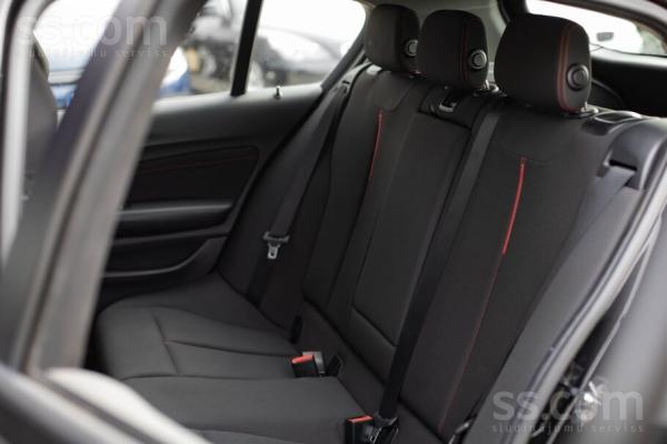 Black BMW 118 2011 in Riga, with an engine capacity of 2.00 L and mileage of 325 thousand km for 6290 €, photo 10 on AUTOMOTO.COM.LV