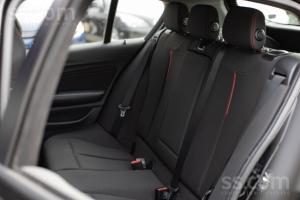 Black BMW 118 2011 in Riga, with an engine capacity of 2.00 L and mileage of 325 thousand km for 6290 €, photo 11 on AUTOMOTO.COM.LV