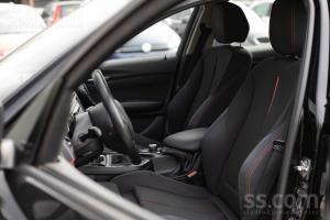 Black BMW 118 2011 in Riga, with an engine capacity of 2.00 L and mileage of 325 thousand km for 6290 €, photo 12 on AUTOMOTO.COM.LV