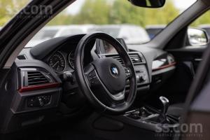 Black BMW 118 2011 in Riga, with an engine capacity of 2.00 L and mileage of 325 thousand km for 6290 €, photo 15 on AUTOMOTO.COM.LV