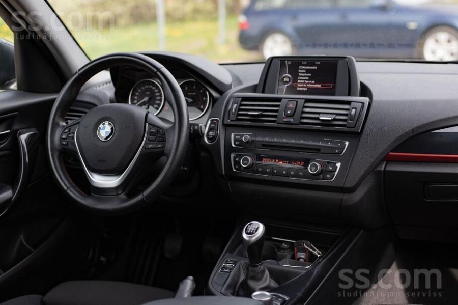 Black BMW 118 2011 in Riga, with an engine capacity of 2.00 L and mileage of 325 thousand km for 6290 €, photo 16 on AUTOMOTO.COM.LV