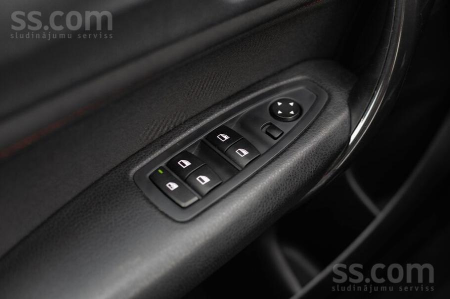 Black BMW 118 2011 in Riga, with an engine capacity of 2.00 L and mileage of 325 thousand km for 6290 €, photo 17 on AUTOMOTO.COM.LV