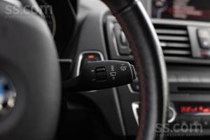 Black BMW 118 2011 in Riga, with an engine capacity of 2.00 L and mileage of 325 thousand km for 6290 €, photo 19 on AUTOMOTO.COM.LV
