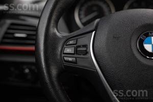 Black BMW 118 2011 in Riga, with an engine capacity of 2.00 L and mileage of 325 thousand km for 6290 €, photo 20 on AUTOMOTO.COM.LV