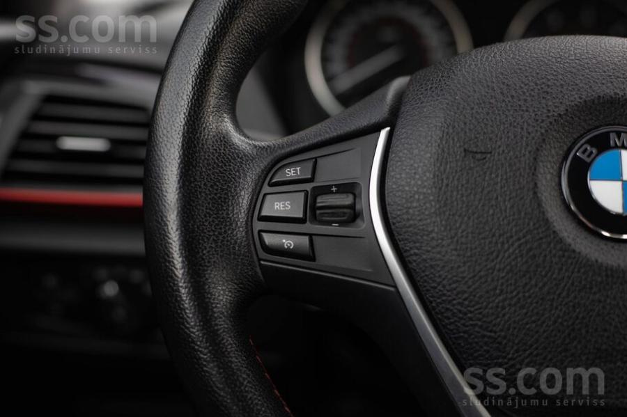 Black BMW 118 2011 in Riga, with an engine capacity of 2.00 L and mileage of 325 thousand km for 6290 €, photo 20 on AUTOMOTO.COM.LV