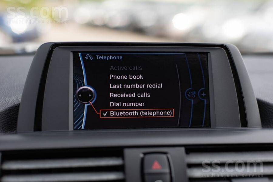 Black BMW 118 2011 in Riga, with an engine capacity of 2.00 L and mileage of 325 thousand km for 6290 €, photo 22 on AUTOMOTO.COM.LV
