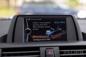 Black BMW 118 2011 in Riga, with an engine capacity of 2.00 L and mileage of 325 thousand km for 6290 €, photo 24 on AUTOMOTO.COM.LV
