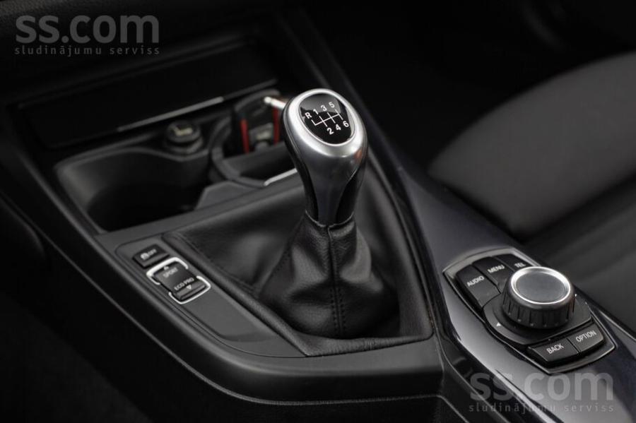 Black BMW 118 2011 in Riga, with an engine capacity of 2.00 L and mileage of 325 thousand km for 6290 €, photo 27 on AUTOMOTO.COM.LV