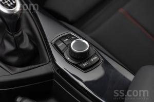 Black BMW 118 2011 in Riga, with an engine capacity of 2.00 L and mileage of 325 thousand km for 6290 €, photo 28 on AUTOMOTO.COM.LV