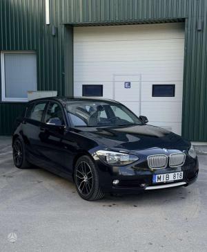 Black BMW 118 2011 in Vilnius, with an engine capacity of 2.00 L and mileage of 310 thousand km for 6000 €, photo  on AUTOMOTO.COM.LV