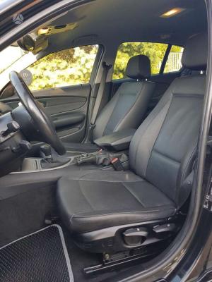 Black BMW 118 2011 in Kaunas, with an engine capacity of 2.00 L and mileage of 259 thousand km for 4400 €, photo 11 on AUTOMOTO.COM.LV