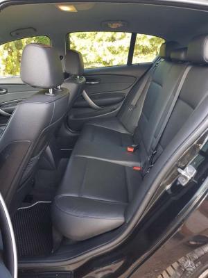 Black BMW 118 2011 in Kaunas, with an engine capacity of 2.00 L and mileage of 259 thousand km for 4400 €, photo 13 on AUTOMOTO.COM.LV