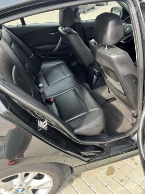 Black BMW 118 2011 in Alytus, with an engine capacity of 2.00 L and mileage of 360 thousand km for 4250 €, photo 15 on AUTOMOTO.COM.LV