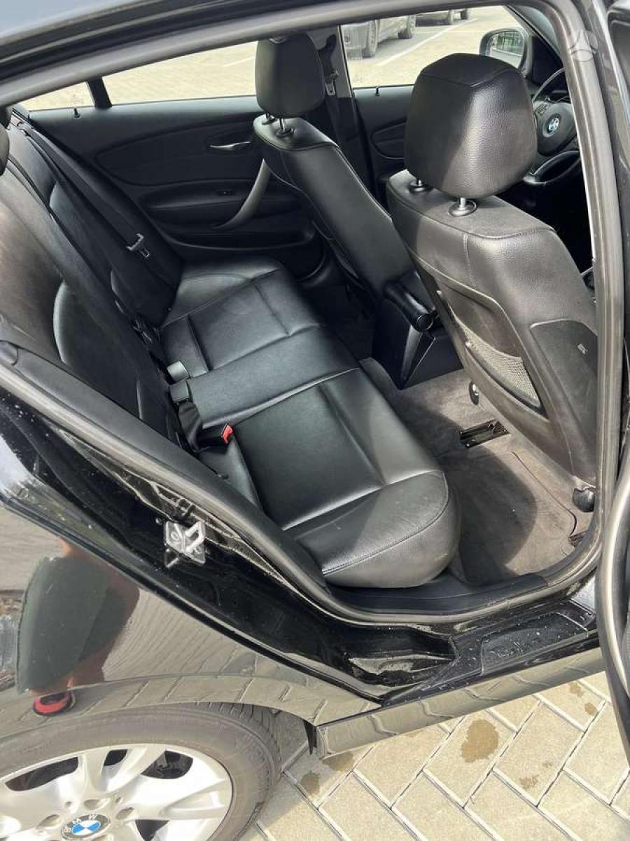 Black BMW 118 2011 in Alytus, with an engine capacity of 2.00 L and mileage of 360 thousand km for 4250 €, photo 15 on AUTOMOTO.COM.LV