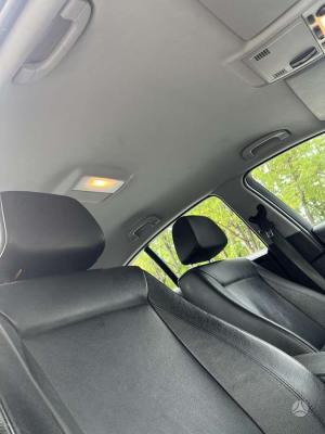 Black BMW 118 2011 in Alytus, with an engine capacity of 2.00 L and mileage of 360 thousand km for 4250 €, photo 16 on AUTOMOTO.COM.LV