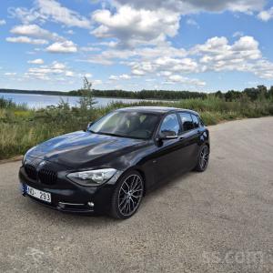 Black BMW 118 2011 in Riga, with an engine capacity of 2.00 L and mileage of 238 thousand km for 5750 €, photo 3 on AUTOMOTO.COM.LV