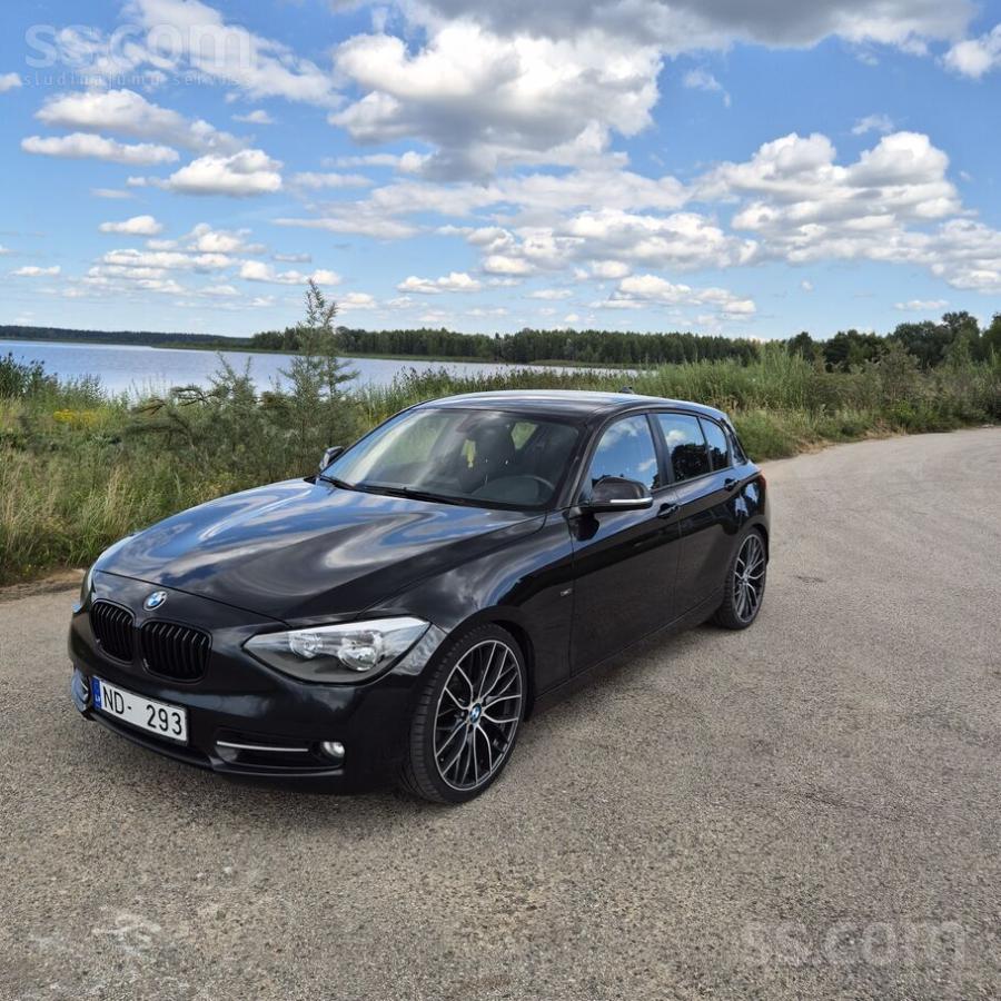 Black BMW 118 2011 in Riga, with an engine capacity of 2.00 L and mileage of 238 thousand km for 5750 €, photo 3 on AUTOMOTO.COM.LV