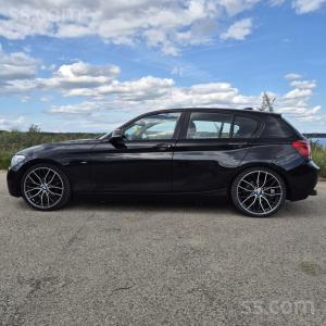 Black BMW 118 2011 in Riga, with an engine capacity of 2.00 L and mileage of 238 thousand km for 5750 €, photo 6 on AUTOMOTO.COM.LV