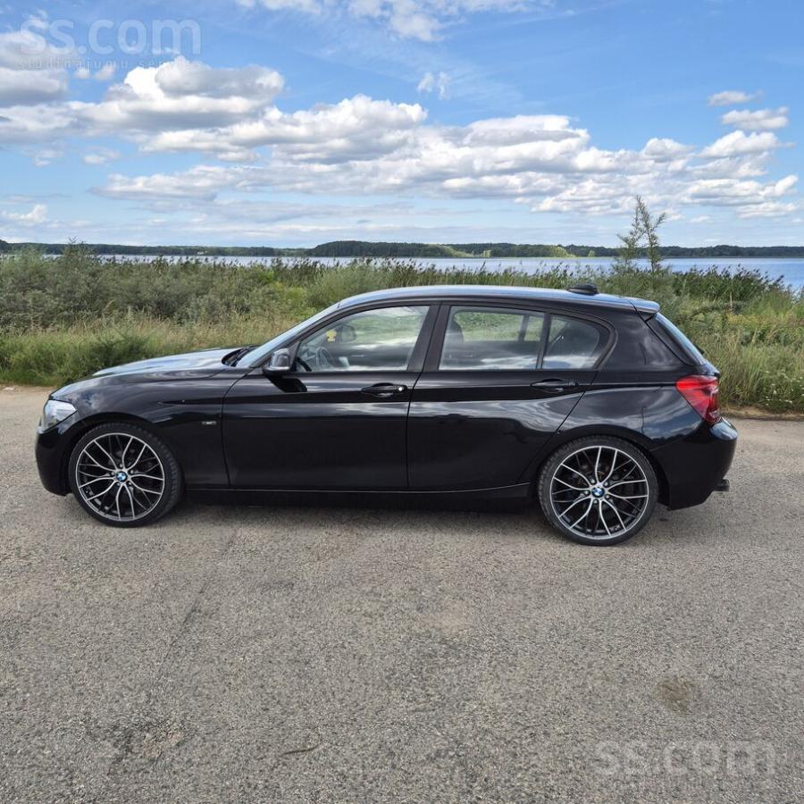 Black BMW 118 2011 in Riga, with an engine capacity of 2.00 L and mileage of 238 thousand km for 5750 €, photo 7 on AUTOMOTO.COM.LV