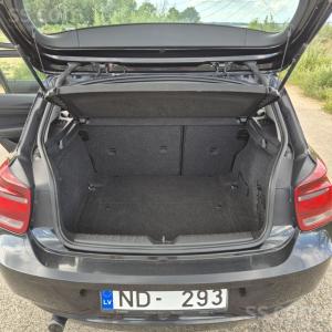 Black BMW 118 2011 in Riga, with an engine capacity of 2.00 L and mileage of 238 thousand km for 5750 €, photo 10 on AUTOMOTO.COM.LV
