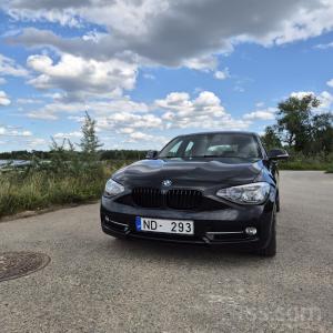 Black BMW 118 2011 in Riga, with an engine capacity of 2.00 L and mileage of 238 thousand km for 5750 €, photo 11 on AUTOMOTO.COM.LV