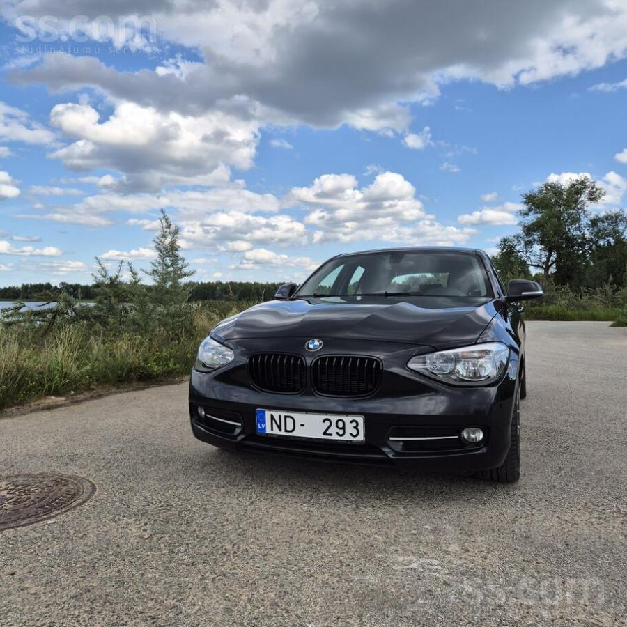 Black BMW 118 2011 in Riga, with an engine capacity of 2.00 L and mileage of 238 thousand km for 5750 €, photo 11 on AUTOMOTO.COM.LV