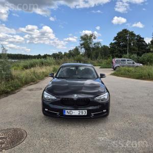 Black BMW 118 2011 in Riga, with an engine capacity of 2.00 L and mileage of 238 thousand km for 5750 €, photo 12 on AUTOMOTO.COM.LV