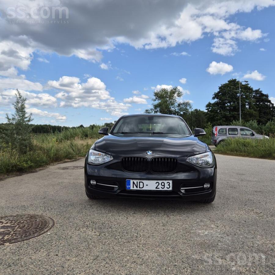 Black BMW 118 2011 in Riga, with an engine capacity of 2.00 L and mileage of 238 thousand km for 5750 €, photo 13 on AUTOMOTO.COM.LV