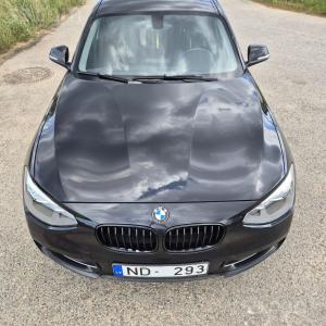 Black BMW 118 2011 in Riga, with an engine capacity of 2.00 L and mileage of 238 thousand km for 5750 €, photo 17 on AUTOMOTO.COM.LV