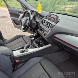 Black BMW 118 2011 in Riga, with an engine capacity of 2.00 L and mileage of 238 thousand km for 5750 €, photo 20 on AUTOMOTO.COM.LV