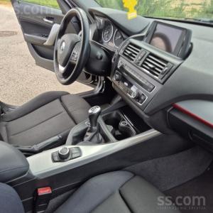 Black BMW 118 2011 in Riga, with an engine capacity of 2.00 L and mileage of 238 thousand km for 5750 €, photo 22 on AUTOMOTO.COM.LV