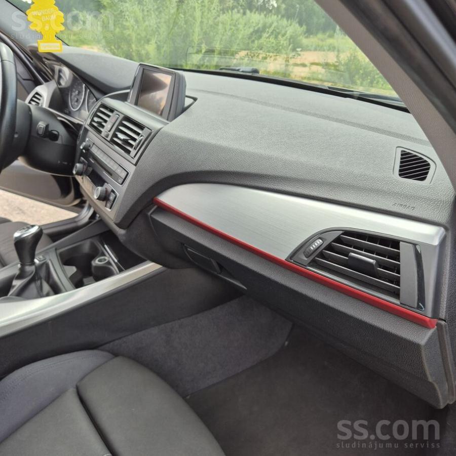 Black BMW 118 2011 in Riga, with an engine capacity of 2.00 L and mileage of 238 thousand km for 5750 €, photo 23 on AUTOMOTO.COM.LV