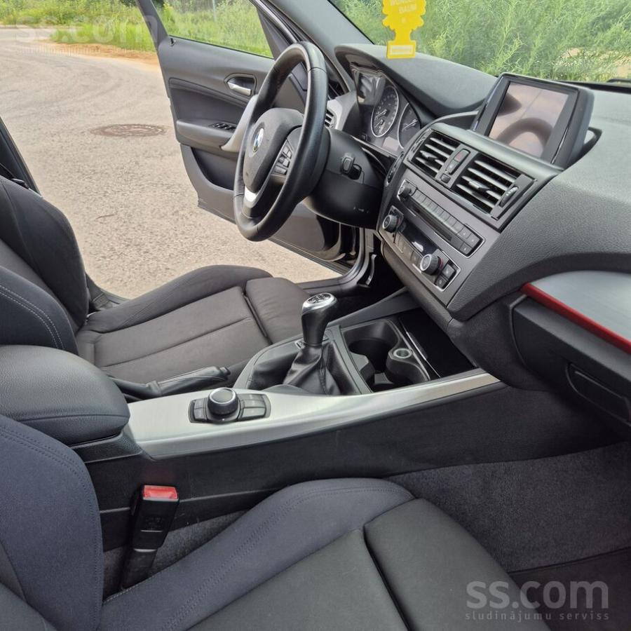 Black BMW 118 2011 in Riga, with an engine capacity of 2.00 L and mileage of 238 thousand km for 5750 €, photo 24 on AUTOMOTO.COM.LV