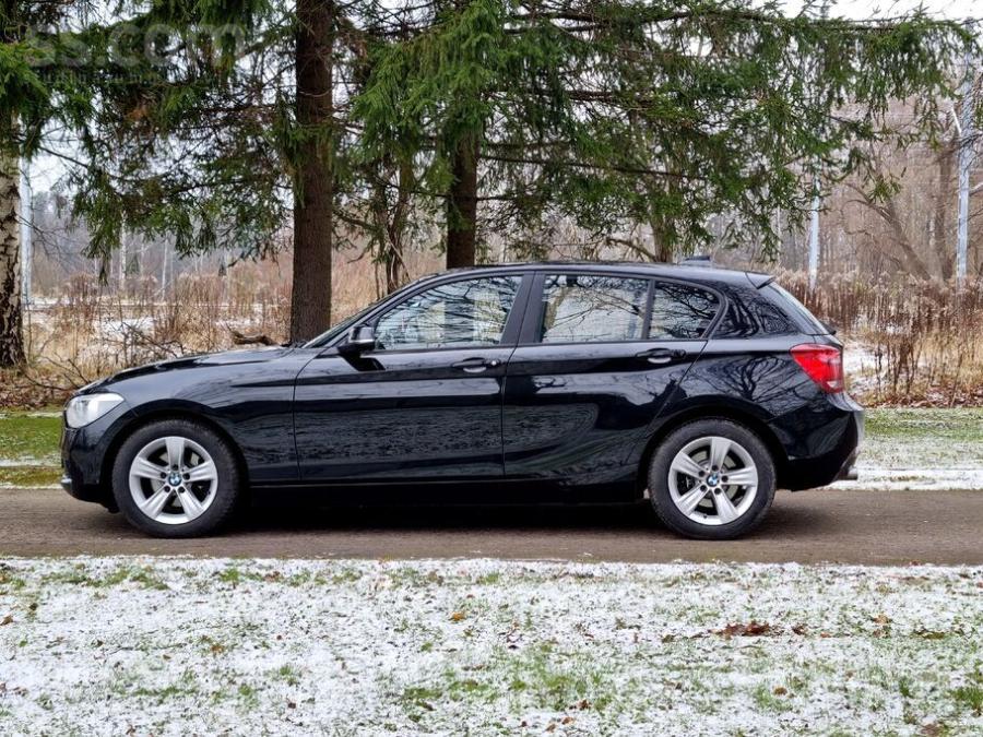 Black BMW 118 2012 in Riga, with an engine capacity of 1.80 L and mileage of 235 thousand km for 7200 €, photo 3 on AUTOMOTO.COM.LV