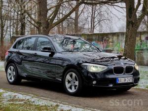 Black BMW 118 2012 in Riga, with an engine capacity of 1.80 L and mileage of 235 thousand km for 7200 €, photo 15 on AUTOMOTO.COM.LV