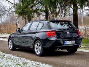 Black BMW 118 2012 in Riga, with an engine capacity of 1.80 L and mileage of 235 thousand km for 7200 €, photo 20 on AUTOMOTO.COM.LV