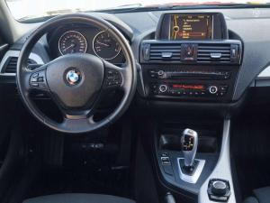 Black BMW 118 2012 in Kretinga, with an engine capacity of 2.00 L and mileage of 139 thousand km for 8550 €, photo 11 on AUTOMOTO.COM.LV