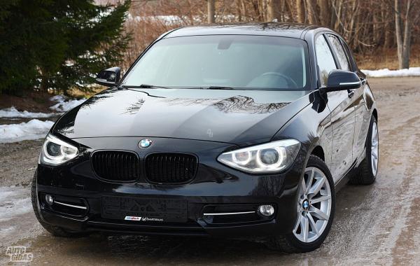 Melns BMW 118 2012 Petrikaičiai, ar dzinēja tilpumu 2.00 L un nobraukumu 139 tūkst. km par 8499 €, foto 1 vietnē AUTOMOTO.COM.LV