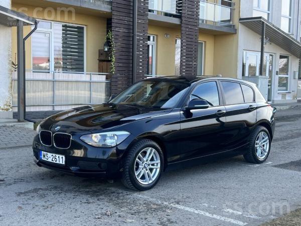 Black BMW 118 2012 in Riga, with an engine capacity of 2.00 L and mileage of 340 thousand km for 6990 €, photo 1 on AUTOMOTO.COM.LV