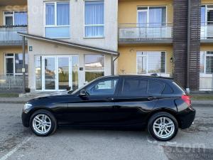 Black BMW 118 2012 in Riga, with an engine capacity of 2.00 L and mileage of 340 thousand km for 6990 €, photo 2 on AUTOMOTO.COM.LV