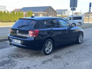 Black BMW 118 2012 in Riga, with an engine capacity of 2.00 L and mileage of 340 thousand km for 6990 €, photo 4 on AUTOMOTO.COM.LV