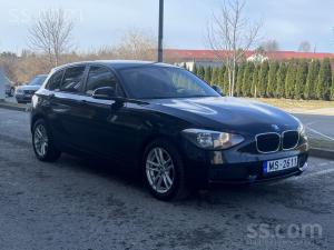 Black BMW 118 2012 in Riga, with an engine capacity of 2.00 L and mileage of 340 thousand km for 6990 €, photo 6 on AUTOMOTO.COM.LV