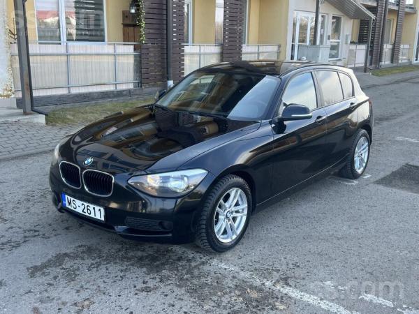 Black BMW 118 2012 in Riga, with an engine capacity of 2.00 L and mileage of 340 thousand km for 6990 €, photo 7 on AUTOMOTO.COM.LV