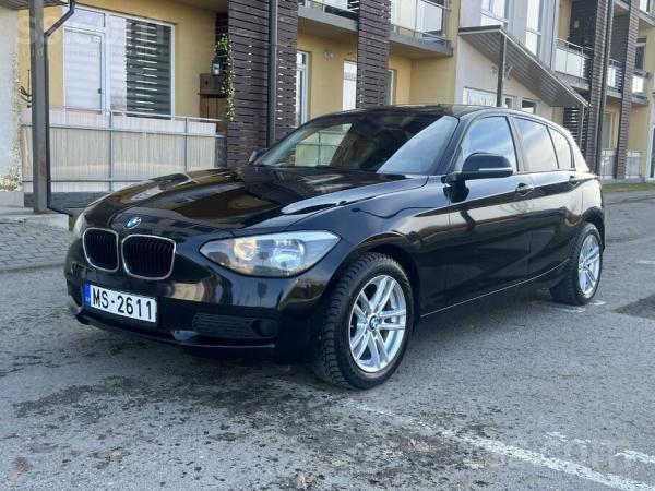 Black BMW 118 2012 in Riga, with an engine capacity of 2.00 L and mileage of 340 thousand km for 6990 €, photo 8 on AUTOMOTO.COM.LV