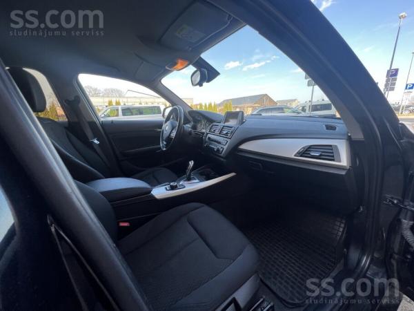Black BMW 118 2012 in Riga, with an engine capacity of 2.00 L and mileage of 340 thousand km for 6990 €, photo 9 on AUTOMOTO.COM.LV