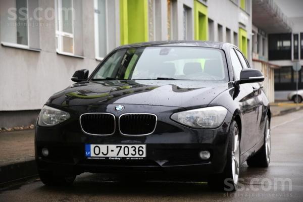 Black BMW 118 2012 in Riga, with an engine capacity of 2.00 L and mileage of 251 thousand km for 7995 €, photo 1 on AUTOMOTO.COM.LV