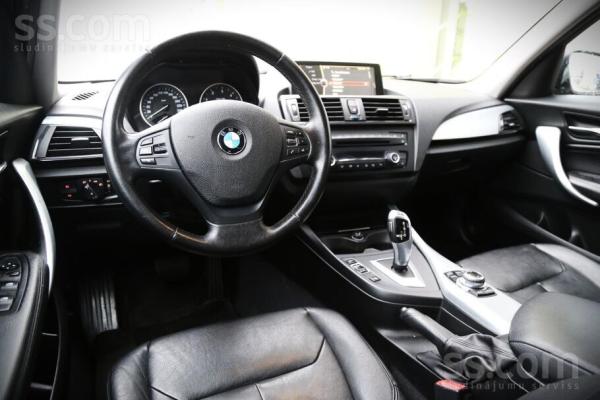 Black BMW 118 2012 in Riga, with an engine capacity of 2.00 L and mileage of 251 thousand km for 7995 €, photo 8 on AUTOMOTO.COM.LV