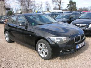 Black BMW 118 2012 in Riga, with an engine capacity of 2.00 L and mileage of 0 thousand km for 8550 €, photo 3 on AUTOMOTO.COM.LV